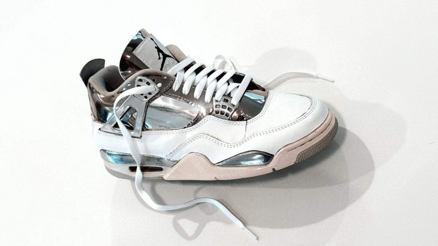 J Balvin x Air Jordan 4 ‘Rayo’ Strikes in Shiny Silver Style